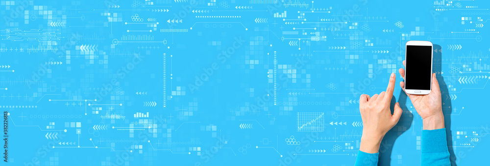 Technology screen with person using a smartphone on a blue background ...