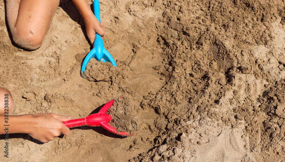 children playing on the beach children playing on the beach with sand ...