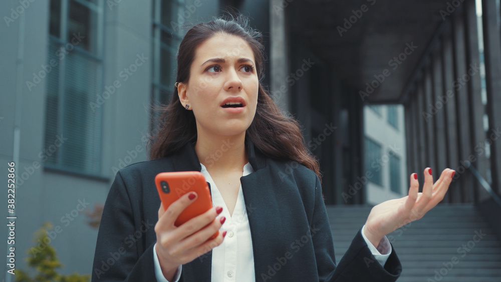 Shocked beautiful caucasian young woman receiving negative feedback ...