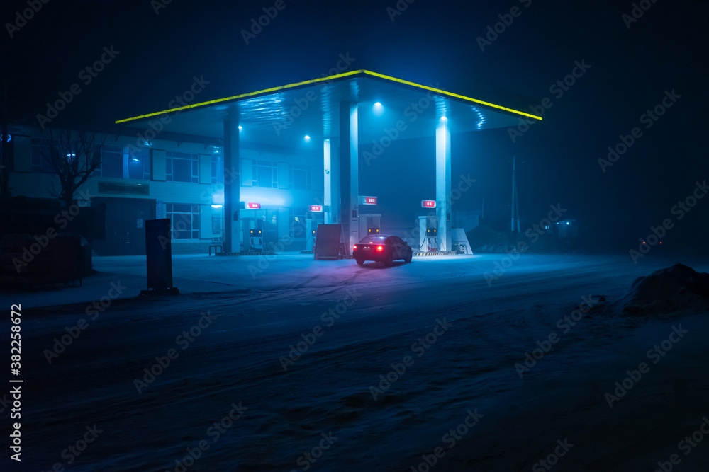 Petrol station at night Stock Photo | Adobe Stock