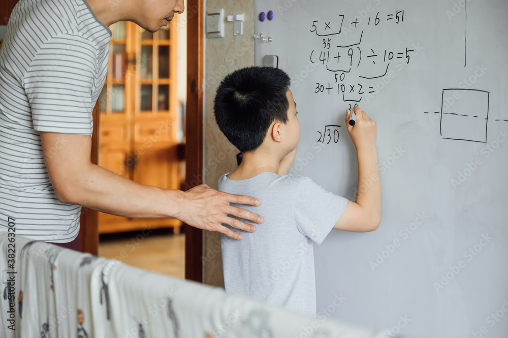 Boy learning at home Stock Photo | Adobe Stock