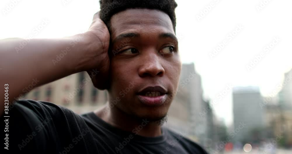 Black man shock reaction. African guy reacting with surprise to news ...