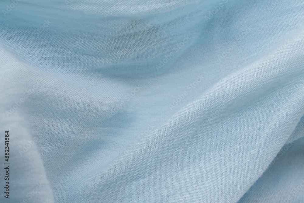 Stylish blue horizontal linen background with soft shadow and folds ...
