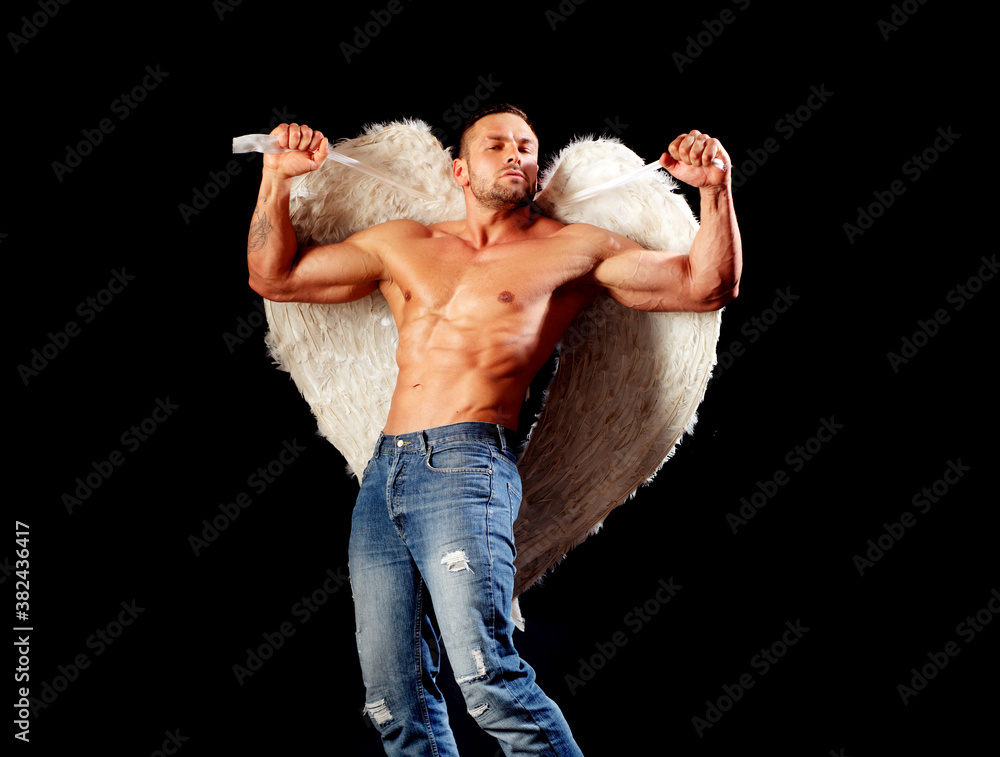 Wings, man angel. Sexy guy with muscular body and bare torso. Stock ...