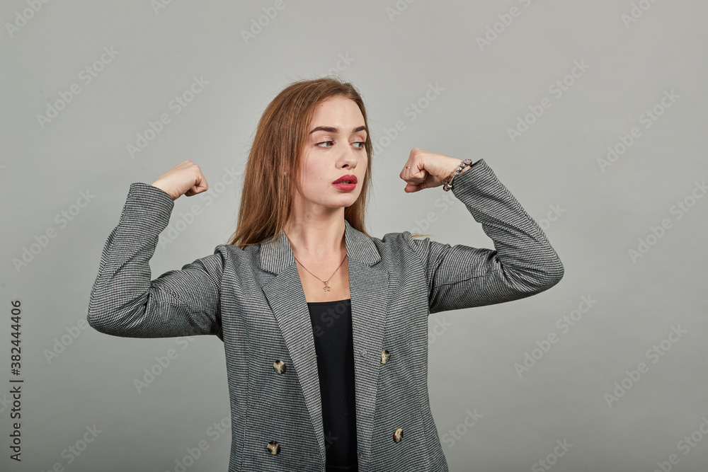 Feels proud have strength, shows great power, raises arms to show ...