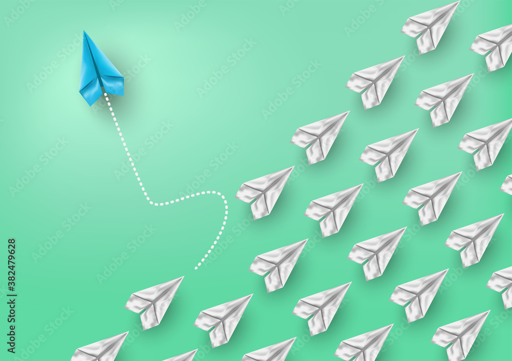 Group of paper airplanes flying.Paper plant in one direction and one ...