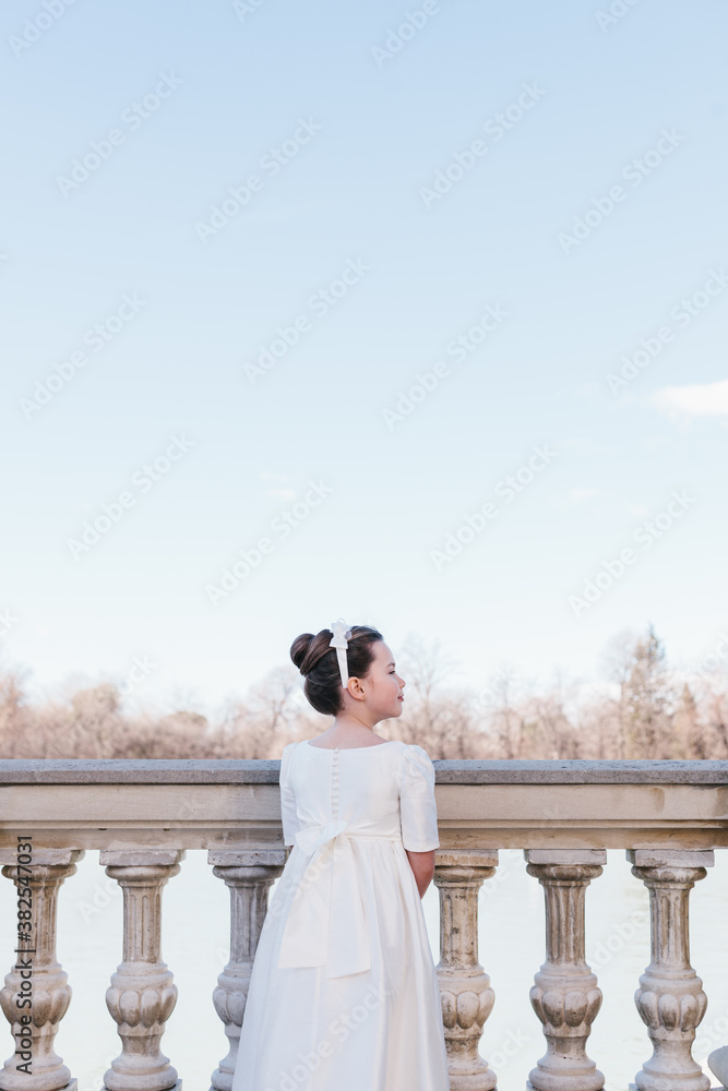Cute Little Girl in Her First Communion Day Stock Photo | Adobe Stock