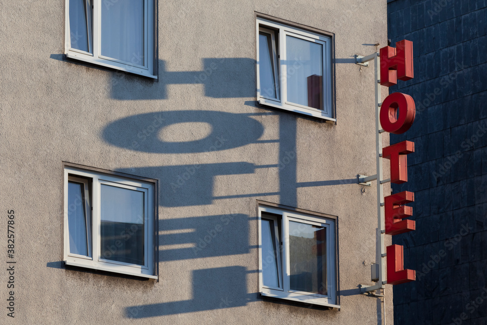 Generic Hotel Sign Attached to a Building Facade Stock Photo | Adobe Stock