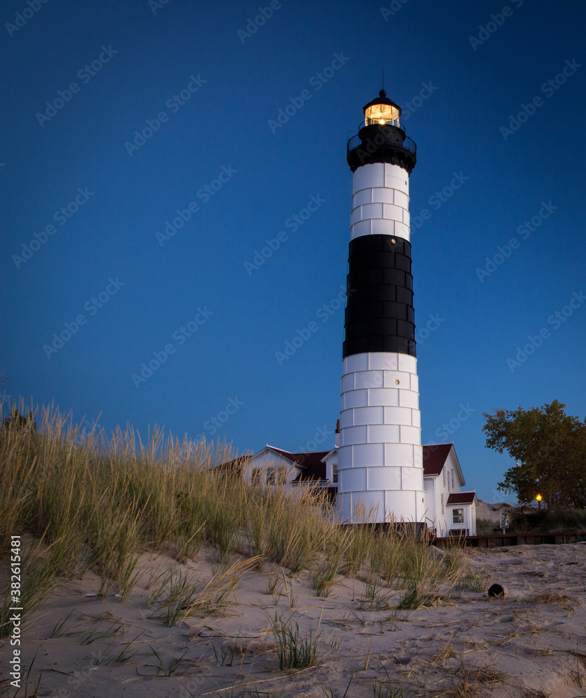 Illuminated Great Lakes Lighthouse In Vertical Orientation. Historical ...