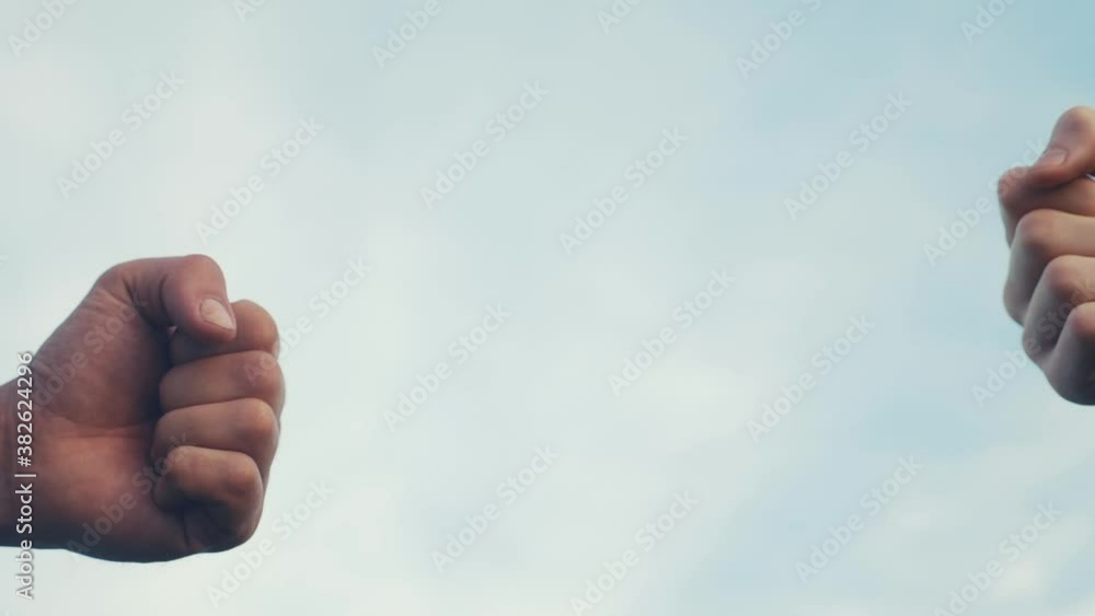 teamwork concept. fist to fist commit solidarity a respect and ...