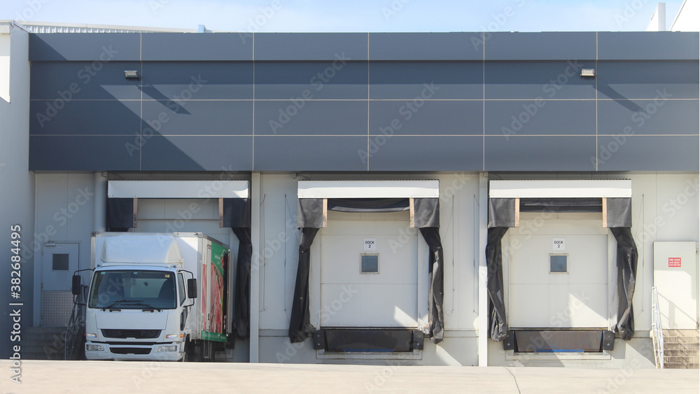 Three refrigerated truck loading docks of a modern food manufacturing ...