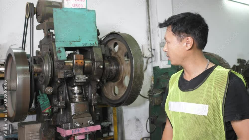 Asian engineer worker take off helmet and safety glasses to relaxing ...