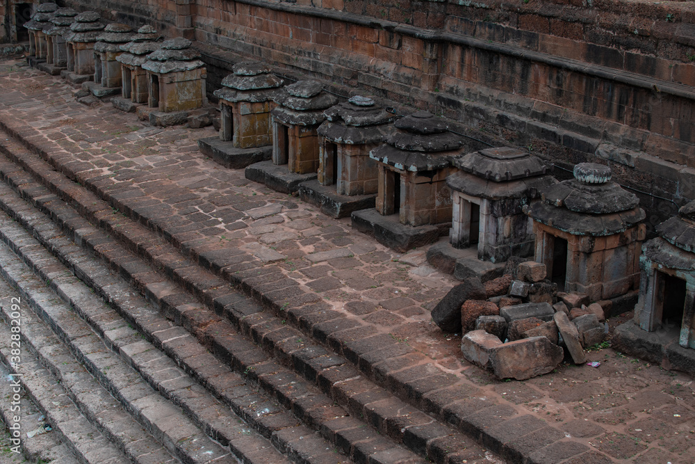 Hindu structures in stone above some stairs in Bhubaneswar, Odisha ...