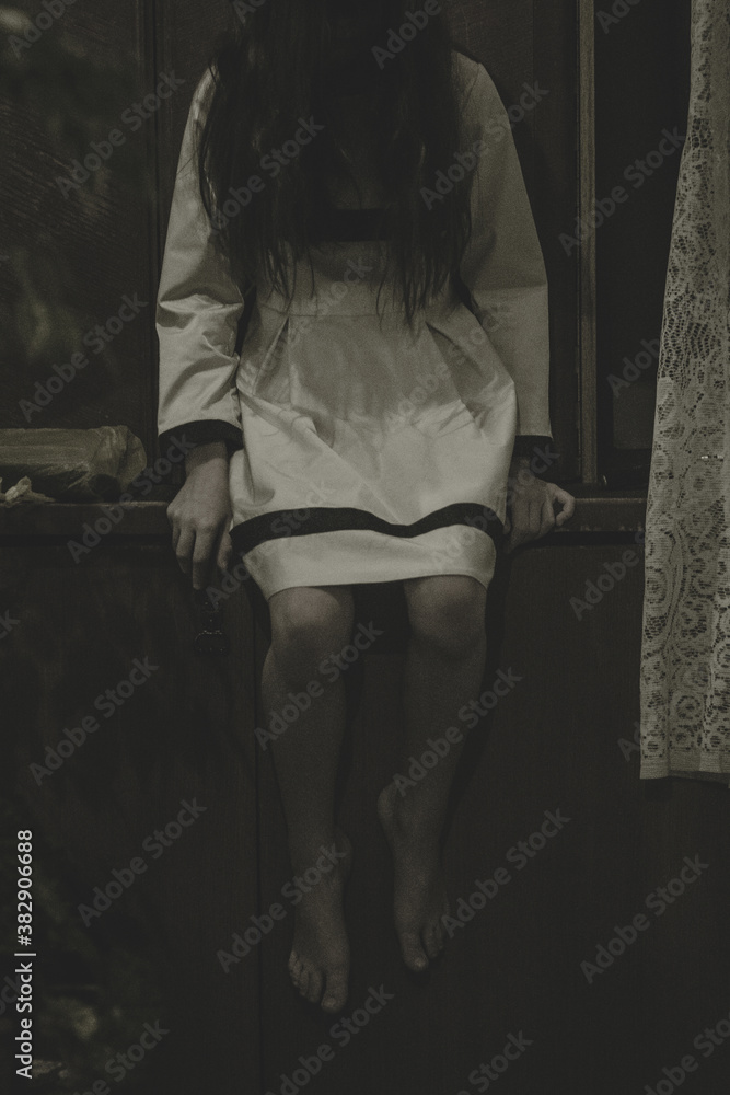 Demon possessed little girl at night. Mad scary girl at dark night ...