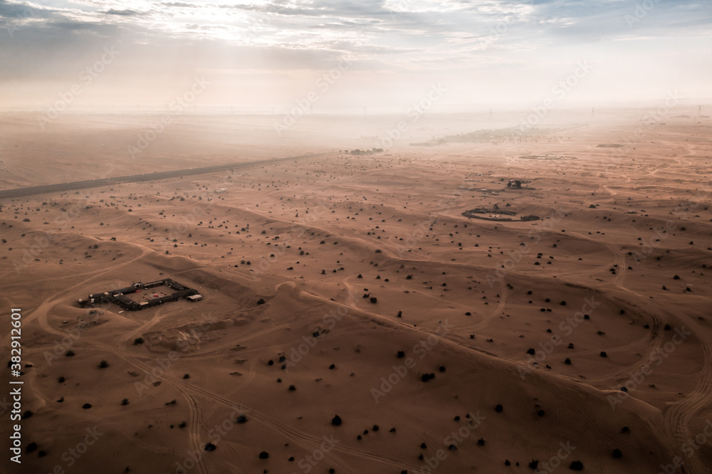 Aerial View Of Light Rays Shining On Sand Dunes Of Arabian Desert In ...