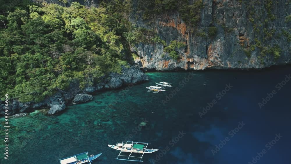 Passenger boat closeup aerial view at cliff ocean shore. Majestic ...