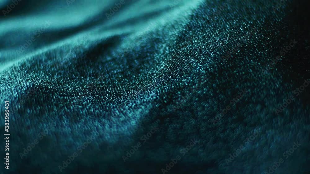 Emerald shiny fabric texture close-up for fashion brand as holiday ...
