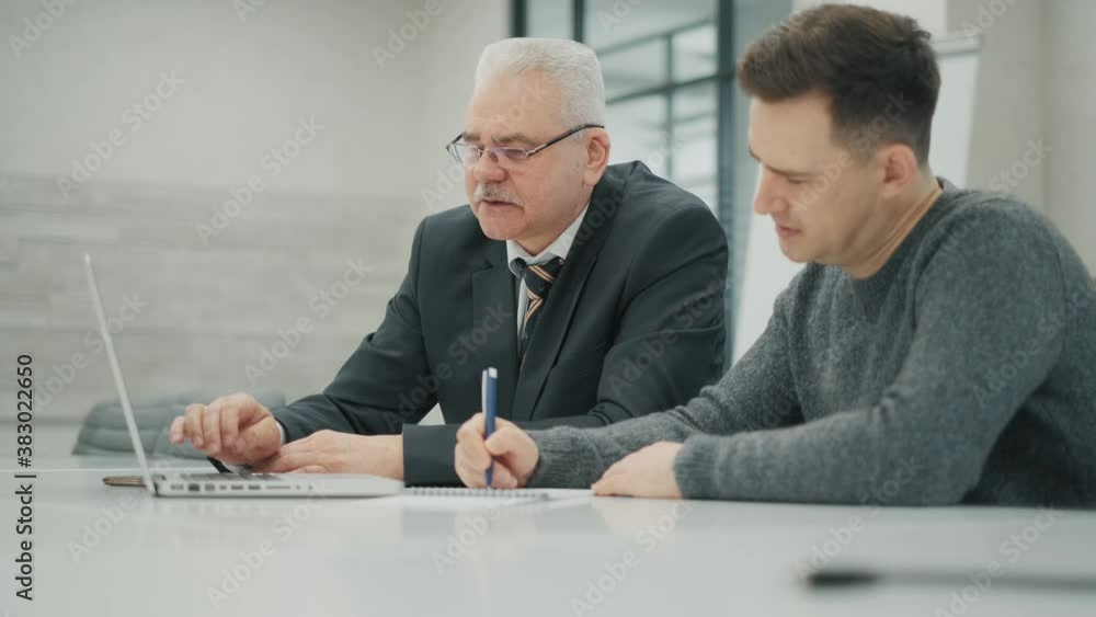 Business people working and planning in startup teamwork. 50s or 60s ...