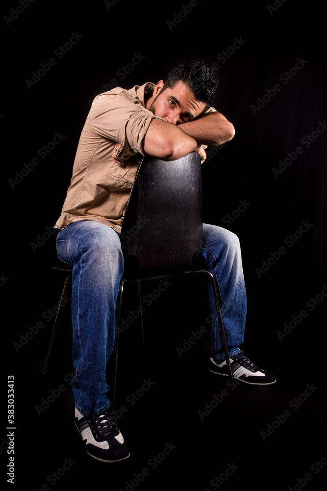 Man With Head Resting In Arms