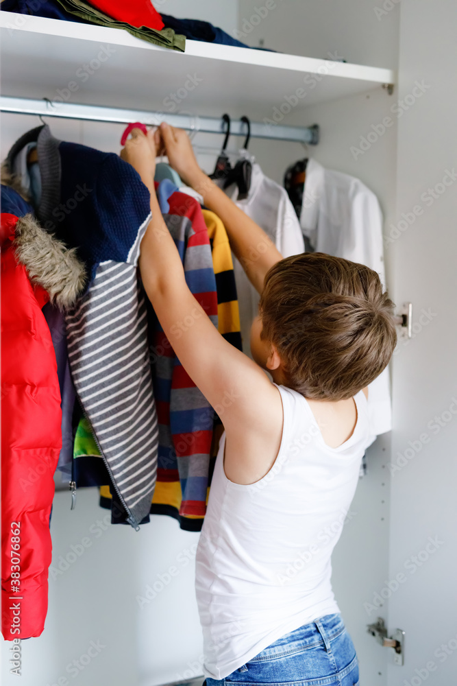 Kid Getting Dressed In The Morning