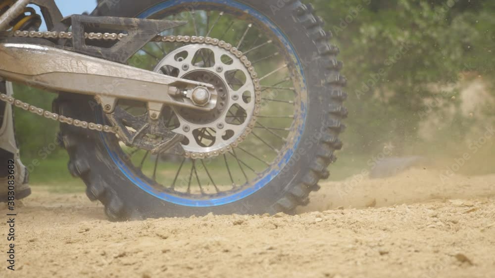 Video Stock Close up wheel of powerful off-road motorcycle spinning and ...