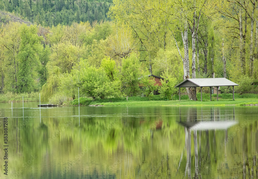 Original outdoor photograph of a glassy river surrounded by the new ...