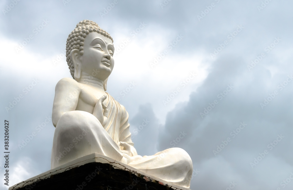 Beautiful photo of Lord Buddha sculpture in white, sitting in calm and ...