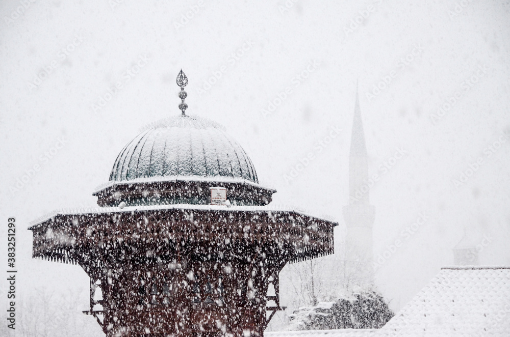 Bascarsija, Sarajevo city centre at winter day. Old town and Sebilj ...