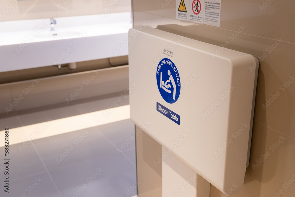 baby changing station in public toilet room. diaper table. Stock Photo ...