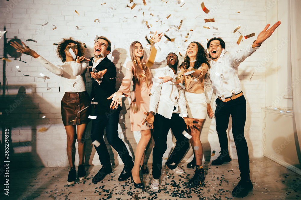 Happy Millennials Celebrating Having Fun Standing Under Falling ...