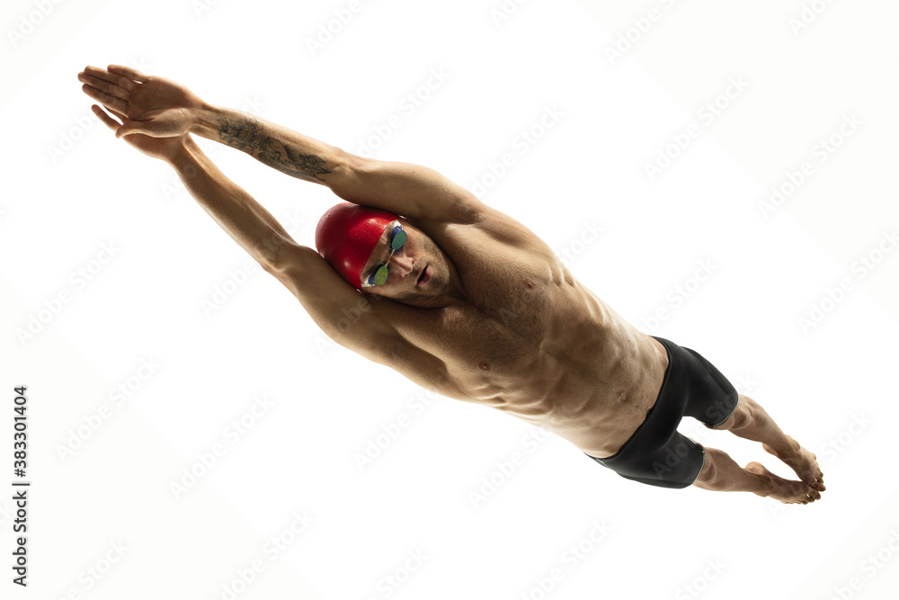 Freedom. Caucasian professional sportsman, swimmer training isolated on ...