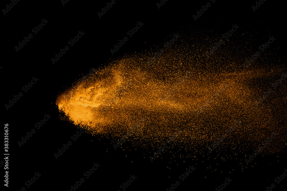 Abstract orange powder explosion isolated on black background. Stock ...