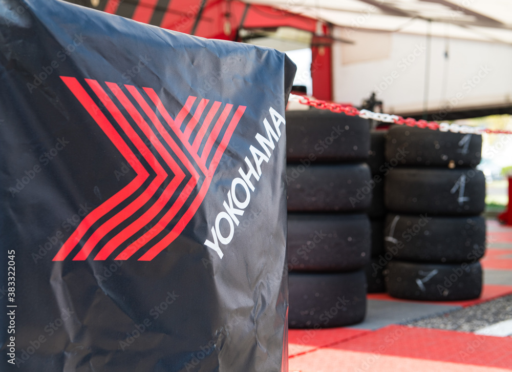 Yokohama racing car tire set in motorsport circuit paddock logo brand ...