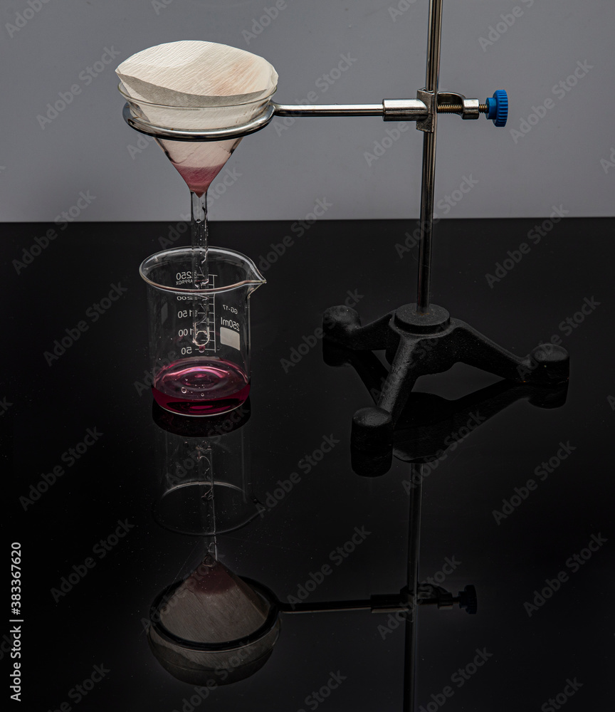 Filter paper in laboratory. Scientists are chemical filtration by ...