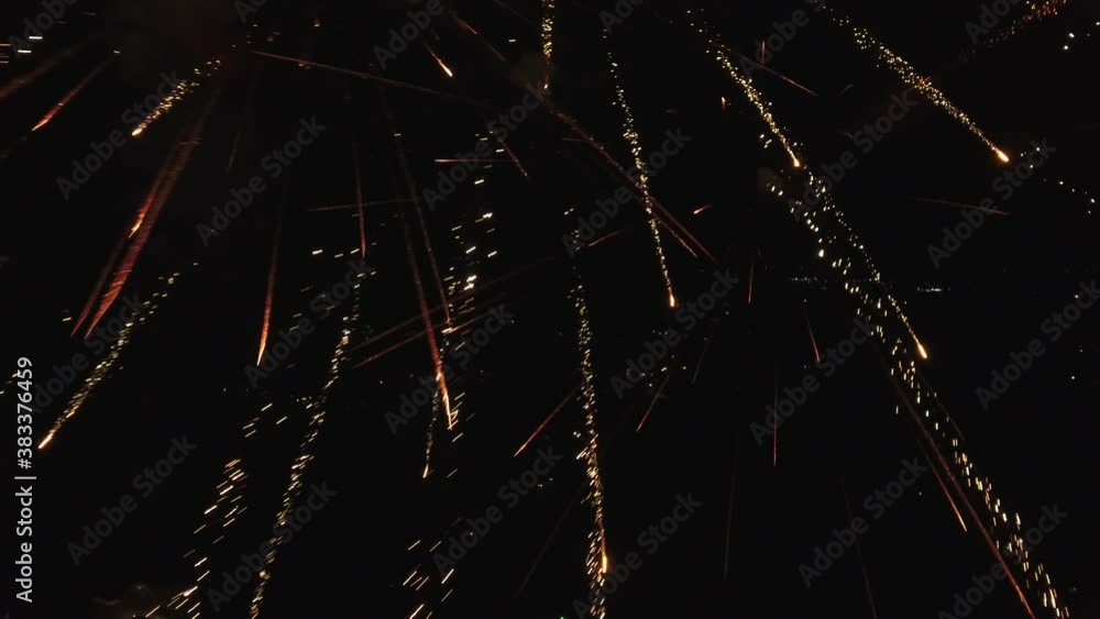 Fireworks falling from night sky, wide aerial Stock Video | Adobe Stock
