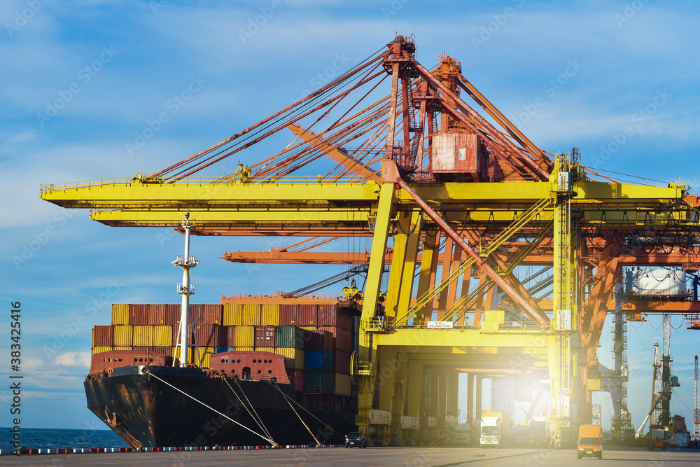 Big ship working at port, large container ship loading, and discharging ...