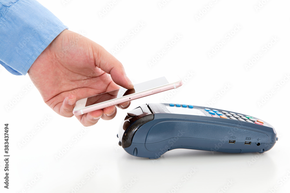 Hand holding mobile phone and scanning payment on pos machine on white ...
