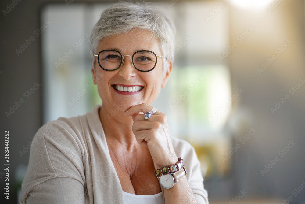 portrait of a beautiful smiling 55 year old woman with white hair Stock ...