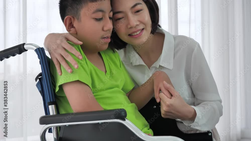 soulful moment. Asian family Mother holding hands and hug son ...