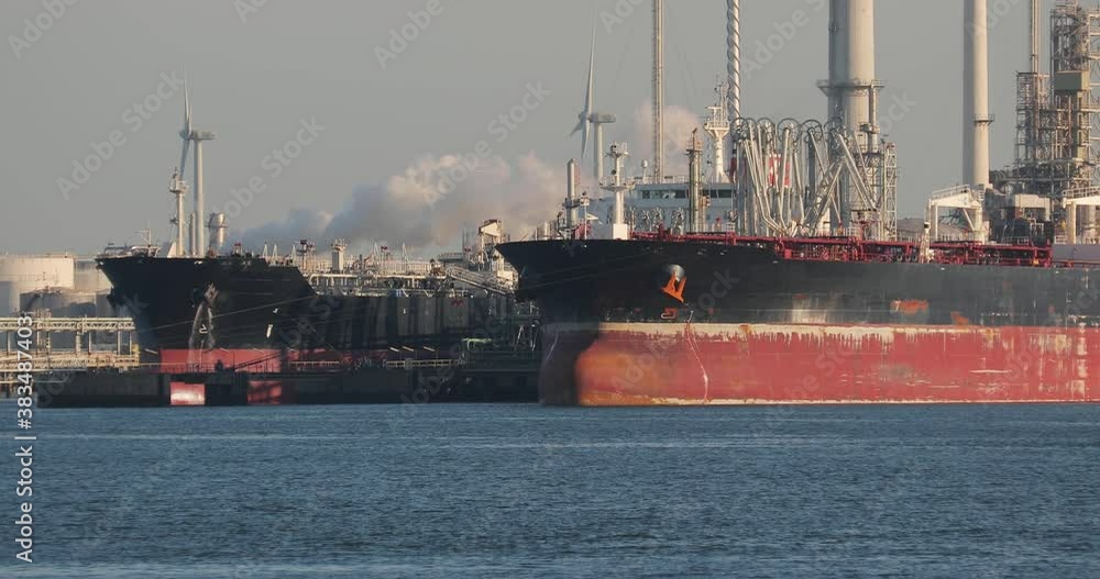 Tanker ships and oil storage silos, oil refinery in the port of ...