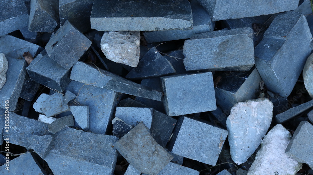 broken blocks and broken stones of different shapes and sizes in a heap ...