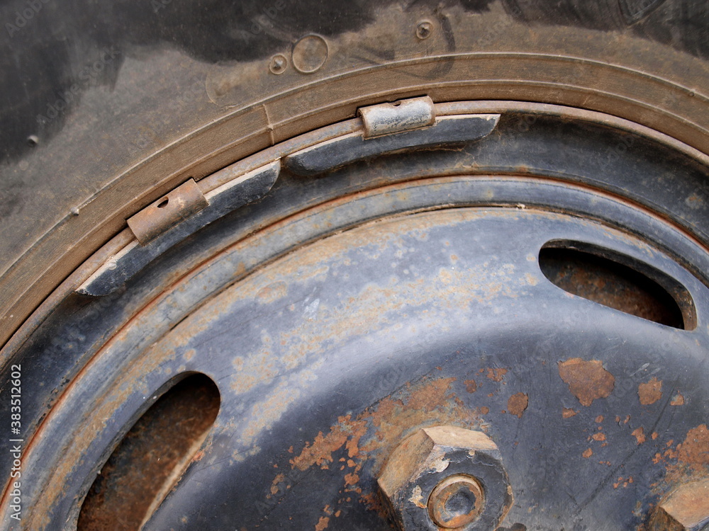 Lead weight on old car rims. Lead-weighted wheel balancing for vehicle ...