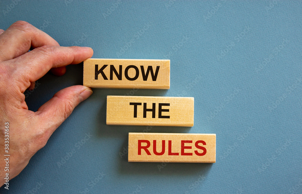 Male hand placing a block with word 'know' on top of a blocks tower ...