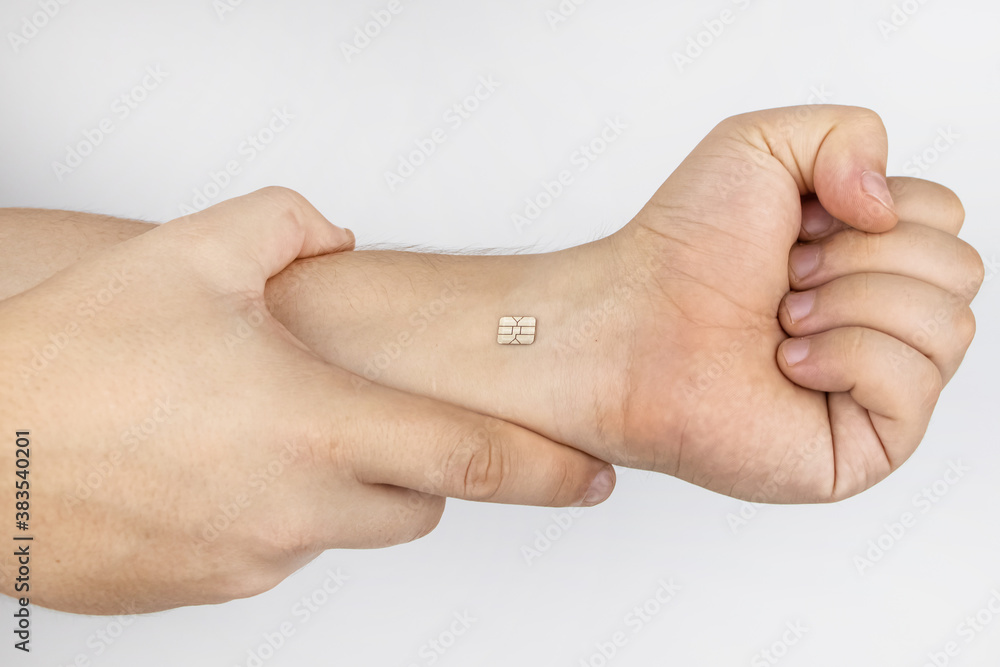 The man shows his hand with a chip implanted. The concept of chipping ...