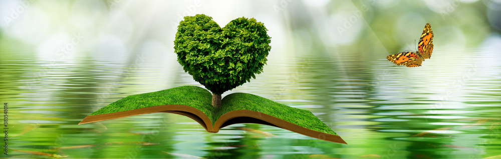 flying open book and a butterfly. Tree in the form of a stylized heart ...
