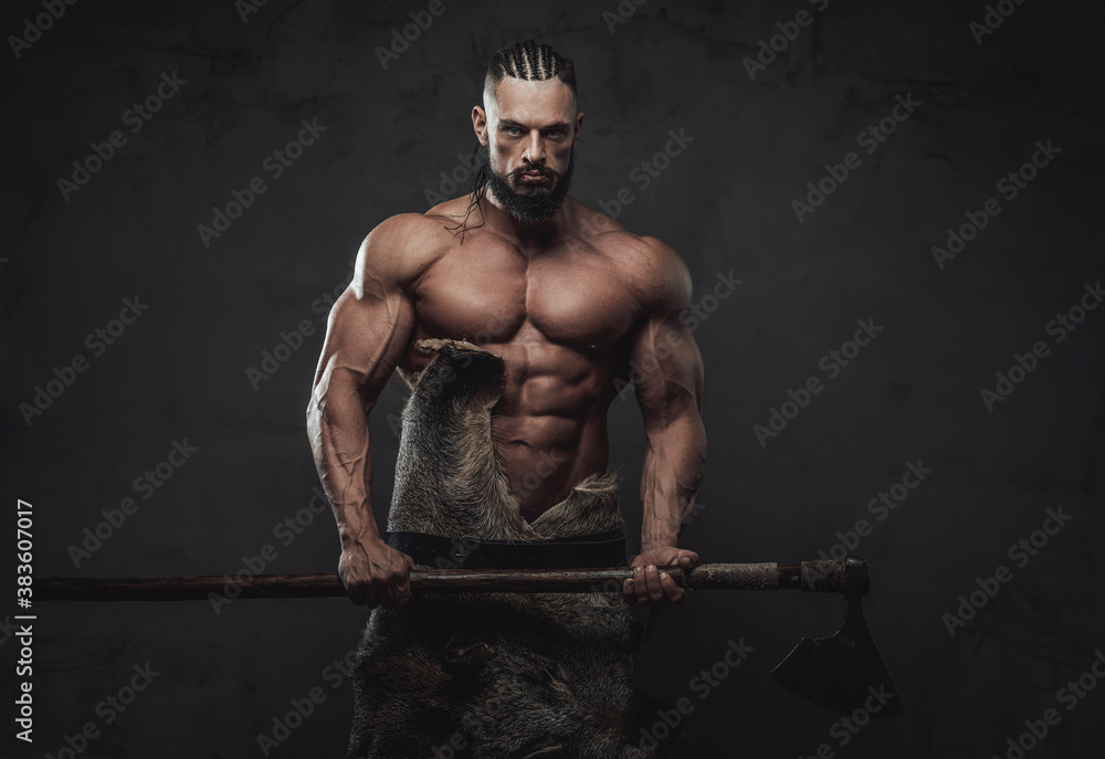 Brutal bodybuilder in fashion of ancient furios viking posing with ...