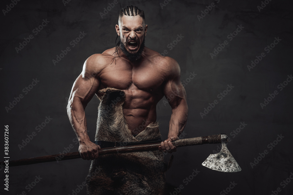 Furious and angry nord warrior with muscular build and dreadlocks ...
