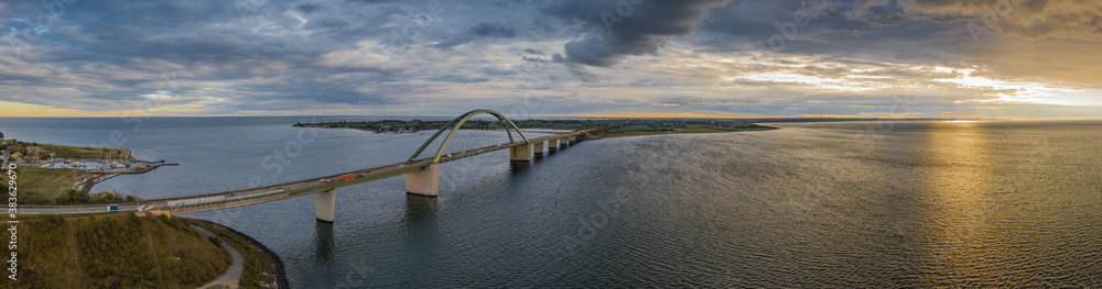Panorama aerial view of Fehmarn Sound Bridge in sunset ...