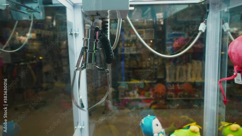 Video Stock Moving forceps of the claw crane machine. Unsuccessful ...