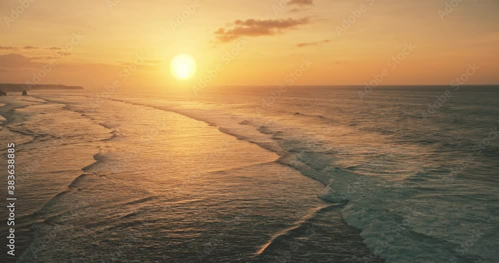 Slow motion of ocean waves at sun set light aerial view. Sunset wavy ...